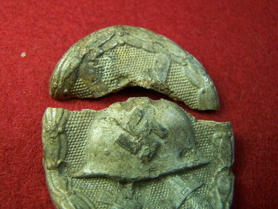 Battle damaged silver class wound badge.- Battlefield Relics